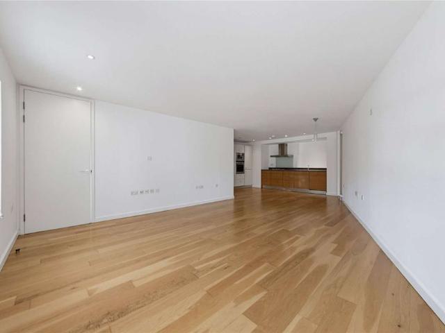 Modern one double bedroom property boasting 804 ft2 of living space. Comprising one double bedroom, bright open plan kitchen and reception room and main bathroom