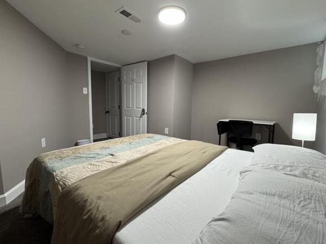 Modern & newly renovated Baltimore House with ample parking and backyard, stone throw from several amenities including banks and less than 15 minutes from the Baltimore downtown area