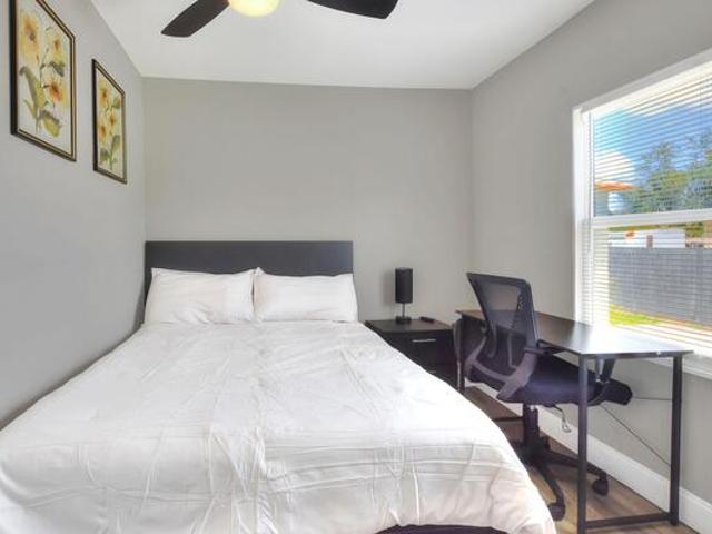 Modern Renovated Bartow Home with – Workspaces, Mini Fridges & TVs in Every Room
