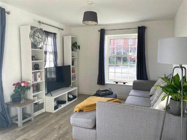 Modern well presented two bedroom ground floor apartment benefitting from parking
