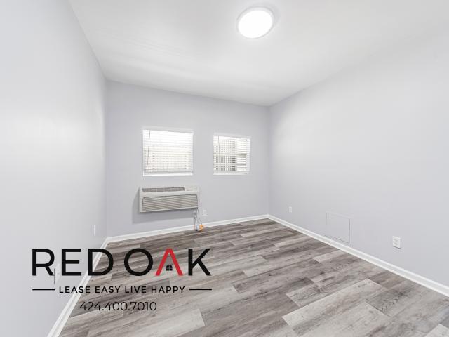 Modern Two Bedroom with Lots of Natural Light and Included Parking ~ Just Outside Harvard Heights!