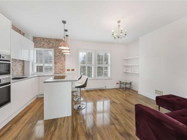 Modernised two bedroom apartment with a large open plan kitchen and reception room