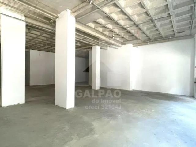 Moema loja de esquina em vão livre, duas vagas laterais, em baixo de condominio residencia. Fachada