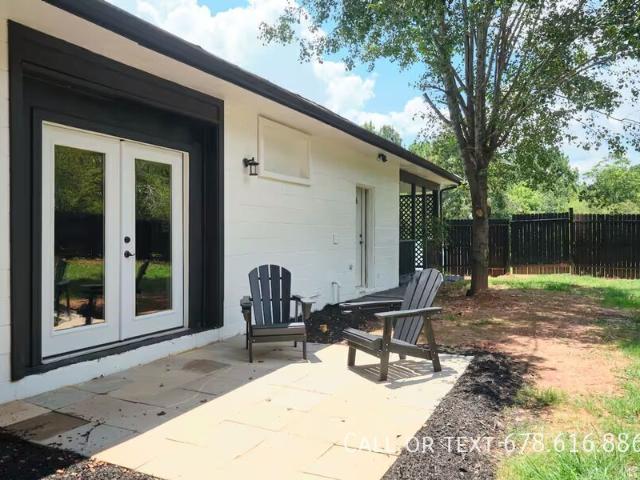 Move In Ready Furnished Duplex with Private Yard & Utilities Included
