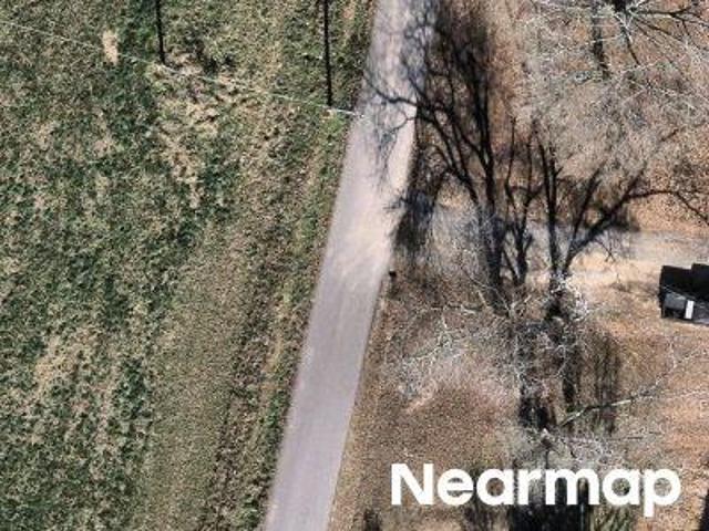 NE Tom Manis Rd