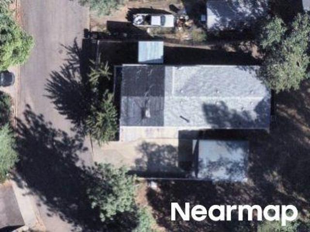 NE Carmen St