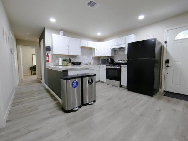 Newly remodeled home with dining area and back yar