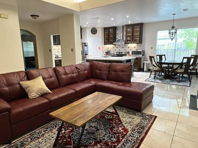 Newly remodeled home with dining area and back yar