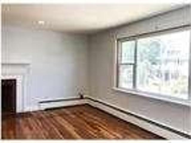 Newly renovated sunny 2 bed/ 1 bath with large sunroom