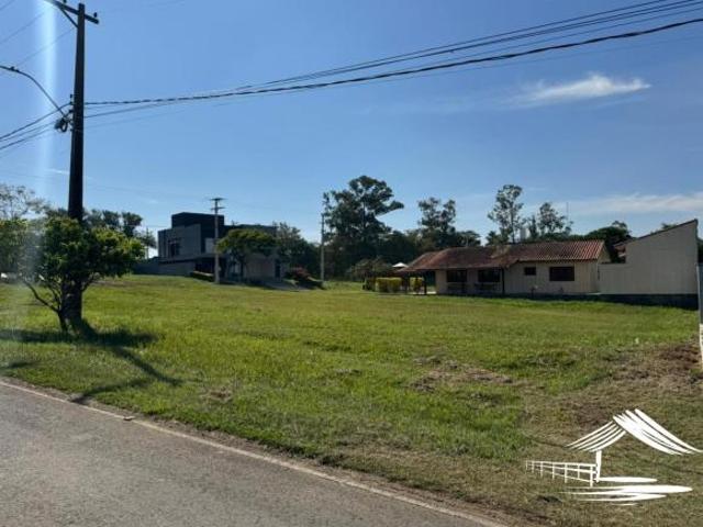 Ninho Verde 1, terreno área nobre contendo 450 m², frente ao asfalto e escritura registrada