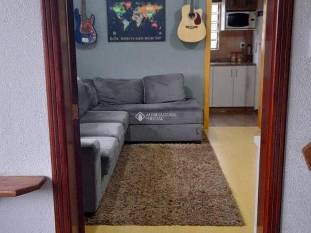 No bairro Partenon. excelente 2 dormitórios com vaga fechada e área privativa de 58,00 m²