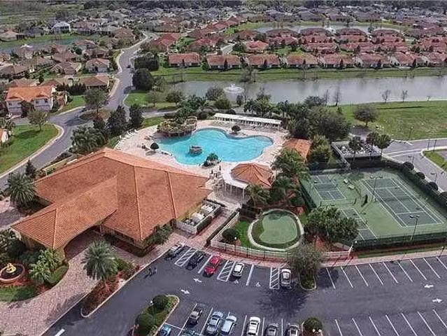 No Carpet, Screen Lanai and a Garage! Gated Condo community wi.