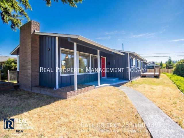 North End Gem – Hardwood Floors, 2 Car Garage & Prime Location