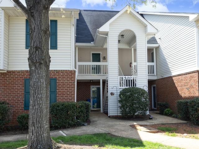 Now Available in Cary! Cozy 2 Bedroom Condo with Fireplace, Pool Access & Covered Porch!