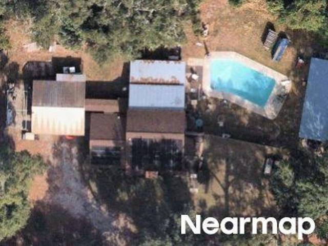 NW 246th St