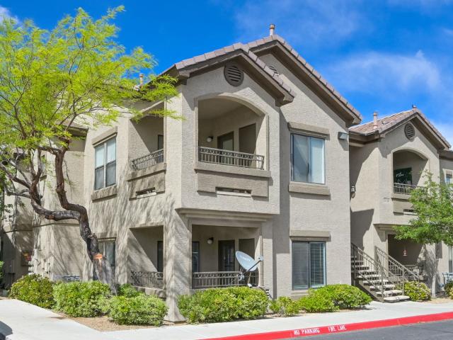 NW! Gated! Clubhouse!Community Pool! 1st Floor Condo! Wood like floors! No Carpet!