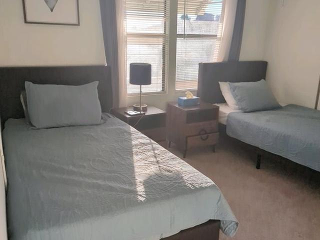 One bed with shared bath