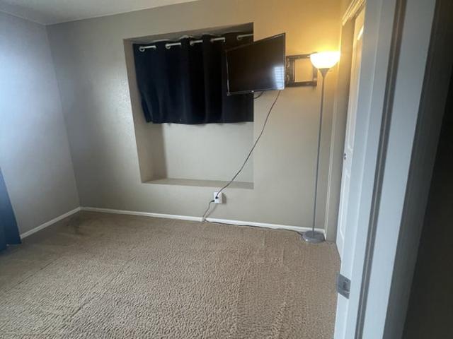 One bedroom with shared bathroom