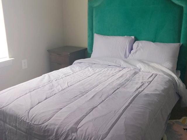 One small room with a full bed