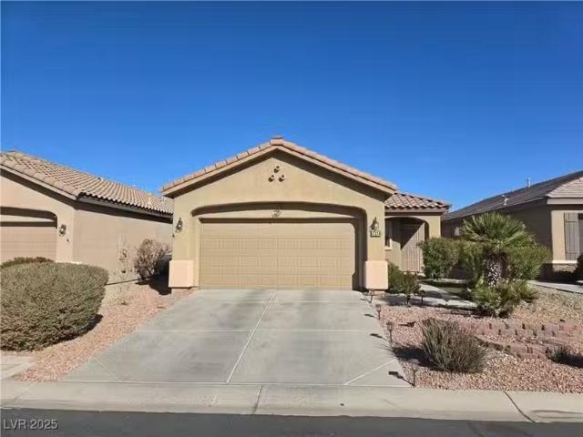 One Story, Single Family Residence Las Vegas, NV 6124 Tokar.