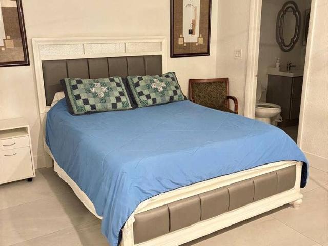 One room with a queen size bed