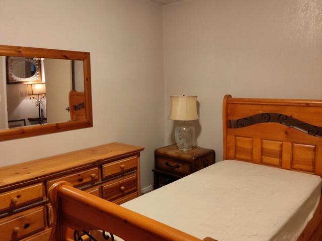 One Room in a Three Bedroom Condo