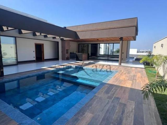 Oportunidade Casa em Condomínio Condomínio Reserva do Paratehy 4 Dormitórios Suítes 500m²