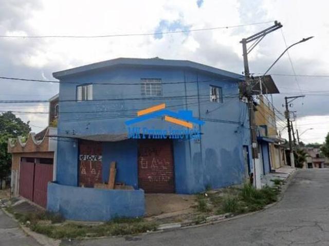Oportunidade de Renda: Imóvel com 3 Casas e Salão Comercial Bela Vista