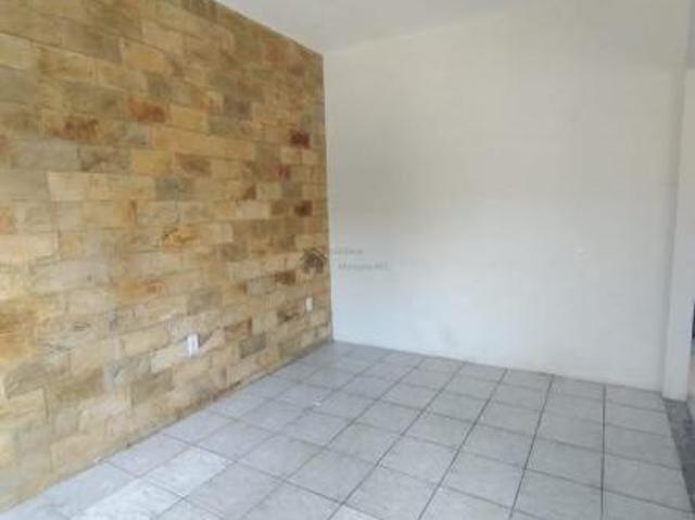 OPORTUNIDADE! EXCELENTE CASA GEMINADA A VENDA LOCALIZADA NO BAIRRO CANADA