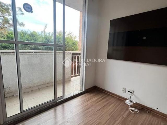 Oportunidade no Morro Santana! Apartamento 2 dormitórios com sacada, churrasqueira e vaga escriturad