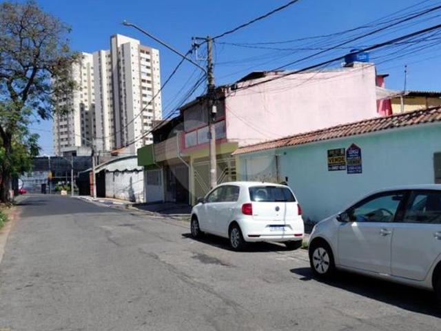 Oportunidade na Vila Rosália: Terreno com 4 Casas – Renda Garantida!