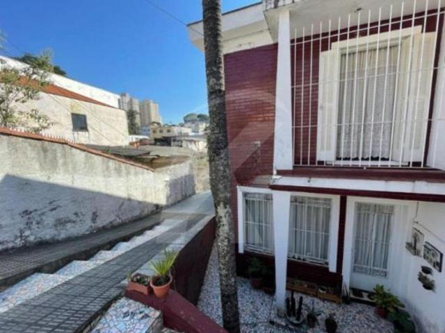 Oportunidade: Sobrado de 414m² com 2 Casas e 6 Vagas de Garagem!
