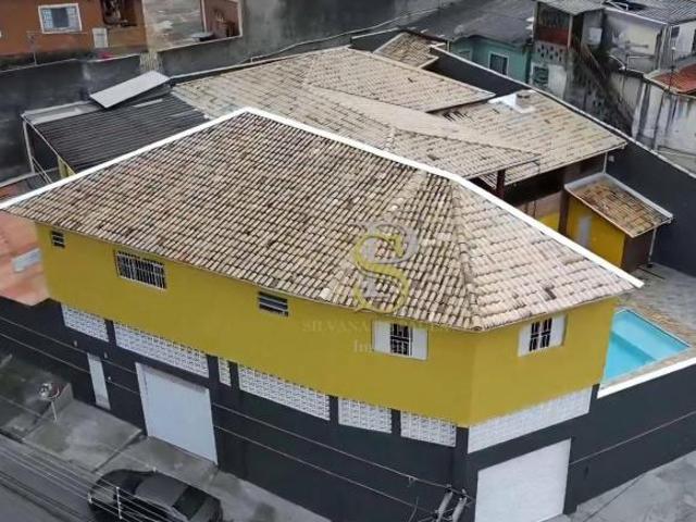 Oportunidade Única: 3 Sobrados a Venda no Mesmo Terreno Moradia e Investimento em Terra Preta