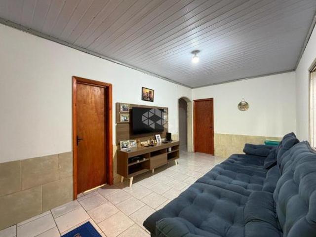 Oportunidade Única em Canoas: Terreno Escriturado com 2 Casas junto ao Shopping