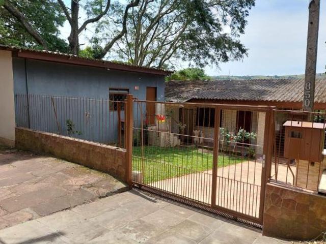 ÓTIMA CASA COM 2 DORM NA VILA NOVA EM TERRENO DE 660m²