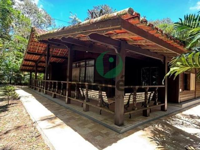 Ótima casa de madeira com 4 quartos 1 suíte à venda no Condomínio Reserva da Mata, em Cananéia SP