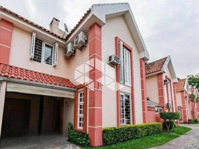 Ótima casa em condomínio 3 dormitórios Baixo custo condomínial Bairro Camaquã