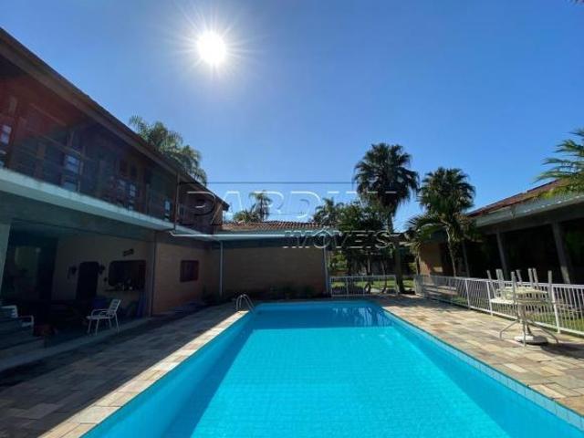 Ótima casa em condomínio com 4 suítes, piscina e espaço gourmet, na praia Dura em Ubatuba!