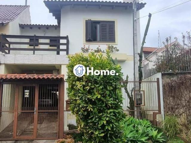 Ótima residência com 3 dormitórios, sendo 1 suíte, lareira e piscina