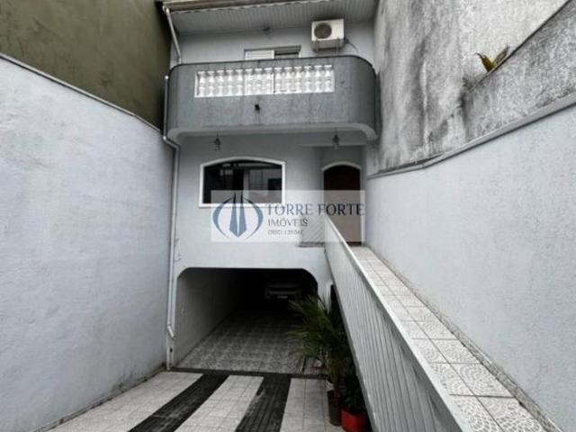 ótimo terreno com 2 casas com total de 3 dormitórios, 6 vagas de carro