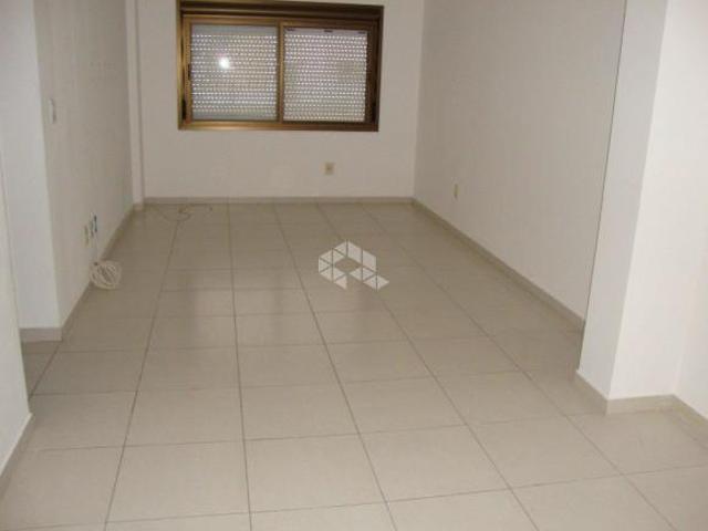 apartamento um dormitório andar alto com piso porcelanato foi todo reformado