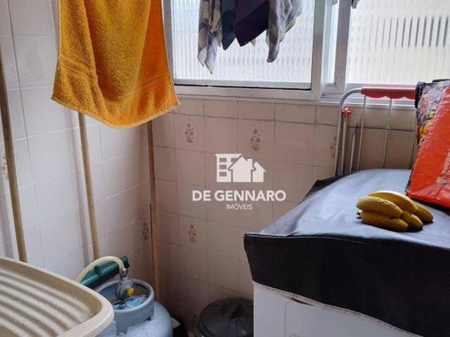 OTIMO APARTAMENTO NA AV MAIS LINDA DA PRAIA GRANDE COM TODO TIPO DE COMERCIO LOJAS BANCOS ETC DEIXE