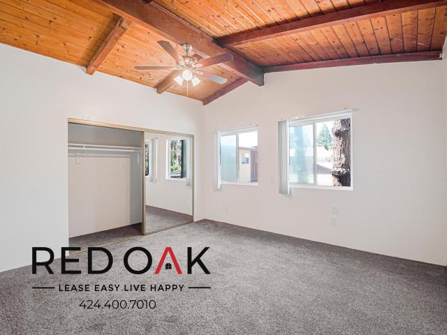 Outstanding Three Bedroom Featuring a Vaulted Ceiling, Pool, Laundry Hook Ups, and Included Parking ~ In Santa Fe Springs!