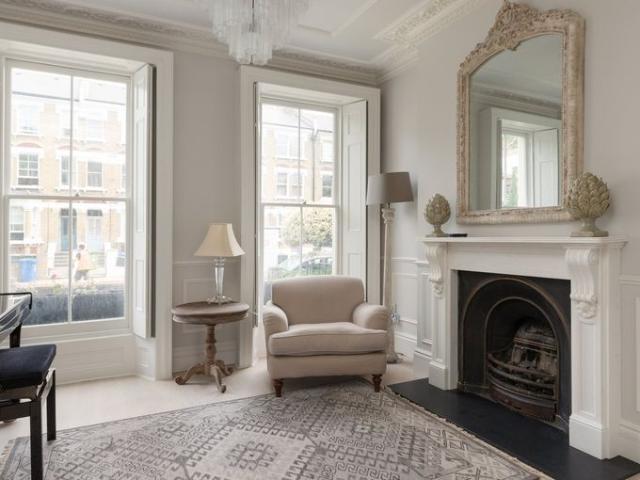 Outstanding town house of over 2400 sq ft finished to an exemplary standard with retained period features and a large rear garden