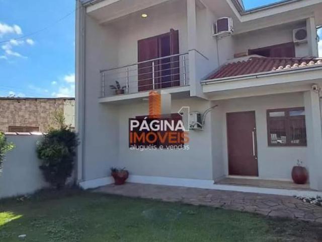 Página 1 Imóveis anuncia casa com 3 dormitórios no bairro Rio Branco em Canoas–RS