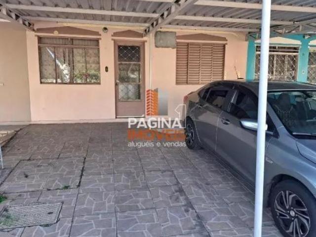 Página 1 Imóveis anuncia Encantadora Casa à Venda em Condomínio no Bairro Igara, Canoas