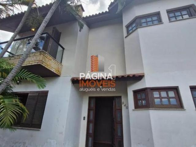 Página 1 Imóveis anuncia excelente casa sobrado com 04 dormitórios, sendo 01 suíte, no bairro Bela V