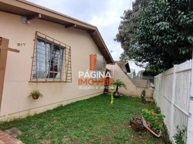 Página 1 Imóveis anuncia excelente casa térrea com 04 dormitórios no Bairro Estância Velha em Canoas
