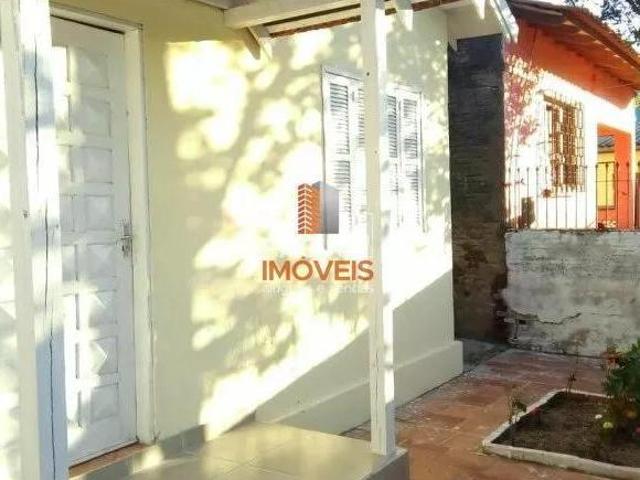 Página 1 Imóveis anuncia ótima oportunidade de casa para venda com 3 dormitórios, no bairro Harmonia