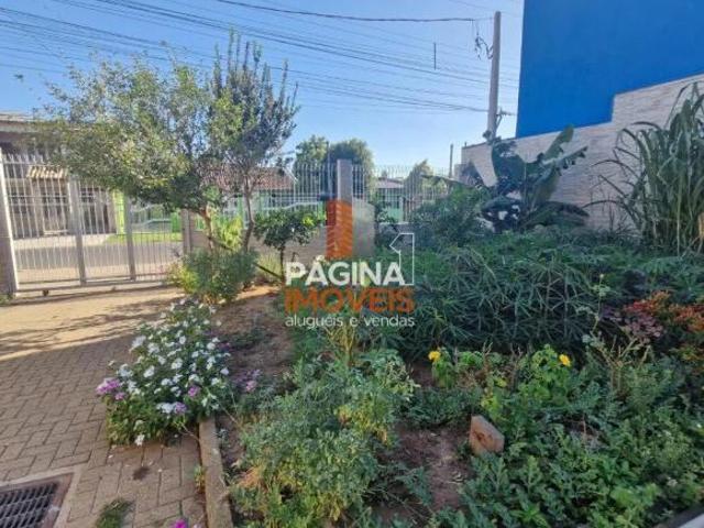 Página 1 Imóveis anuncia para venda, uma linda casa com 03 dormitórios, no bairro Harmonia em Canoas